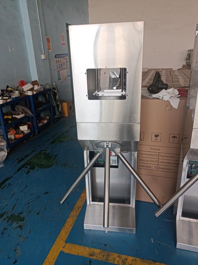 Zento Turnstile Gate in operation showing hand disinfection process