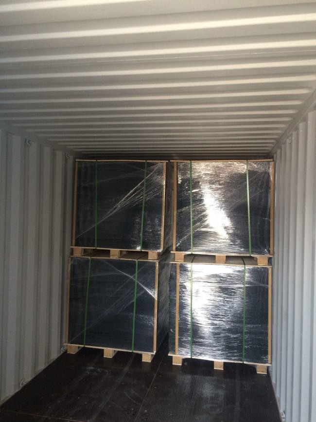 Rubber floor mats packed on pallets ready for shipping