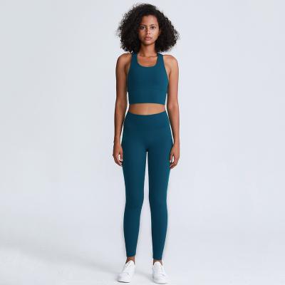 Cina l'usura Strappy della palestra 210gsm dell'incrocio di 2pcs Suitwear mette gli insiemi atletici dell'usura delle donne di TUV in vendita