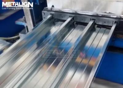 Cina Equipaggiamento di formazione di rotoli di metallo con diametro dell'albero di 95 mm per pavimento YX65-170-550 con sistema di taglio idraulico in vendita