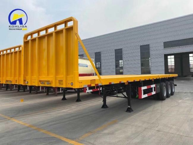 3 Axles 25ton Sinotruk China Manufacture Flatbed Semi-Trailer with Container Lock for Sale