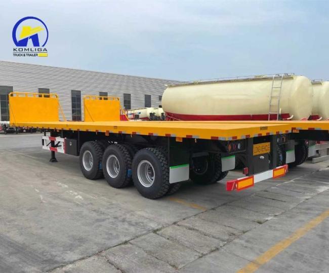 3 Axles 25ton Sinotruk China Manufacture Flatbed Semi-Trailer with Container Lock for Sale