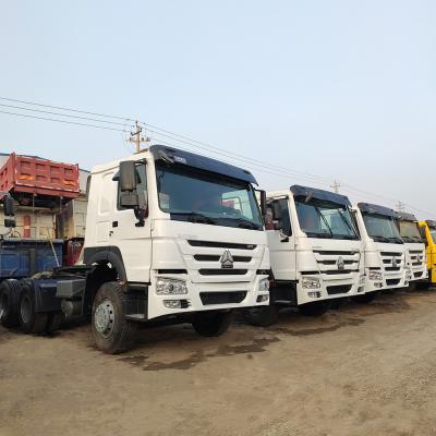 China Zf Steering 315/80r22.5 Tires Sinotruk HOWO 10 Wheels 6X4 International Tractor Truck Head for sale
