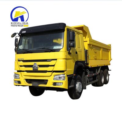 China Triturador ventral de carga hidráulica caminhão de descarga Sinotruk HOWO 6X4 Zz3257n3847A para mineração à venda