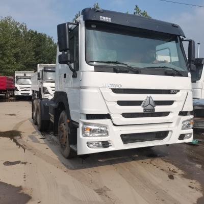 Cina 6×4 volante HOWO Sinotruk Manuale Uomo Diesel Tractor Head Truck Richiesta personalizzata in vendita