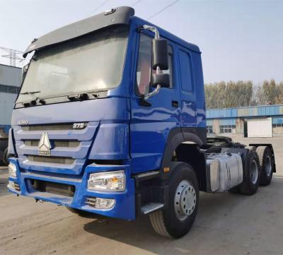 中国 6800*2500*3200mm 3alxes 30t HOWO 400L アルミオイルタンカー付きの中古トラック 販売のため