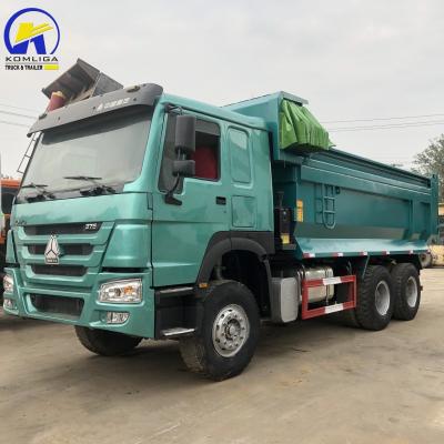Cina Sinotruk HOWO ZZ3257N3847A 3 ruote camion di scarico di seconda mano con capacità di carico da 21 a 30 t in vendita