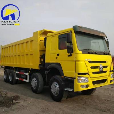 Cina Sinoteuk HOWO 8X4 Dump Truck con dispositivo di sollevamento Capacità di carico 21-30t Potenza forte in vendita