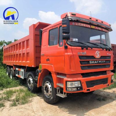 Cina Sinoteuk HOWO 8X4 Dump Truck con dispositivo di sollevamento Capacità di carico 21-30t Potenza forte in vendita