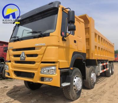 中国 前方リフティングスタイル Sinotruk HOWO 8X4 大容量とイエローダンピングのダンプトラック 販売のため