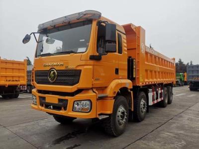 中国 Shacman 8X4 ダンプトラック Hw19710 トランスミッションと2セットのバックアクセルを持つ重型ターパートラック 販売のため
