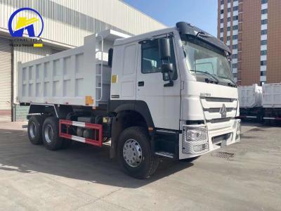 Cina 30 tonnellate 10 pneumatici Camione di scarico per la Tanzania 8500*2500*3400mm Cisterna di carburante 300L Sinotruk HOWO 6X4 in vendita