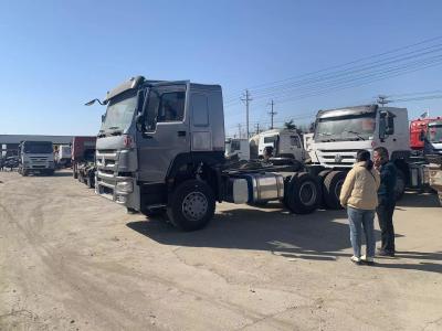 中国 ディーゼル貨物 牽引 10輪 トレーラー ヘッド プライム モーター シノトルク HOWO 6X4 トラクター トラック 販売のため