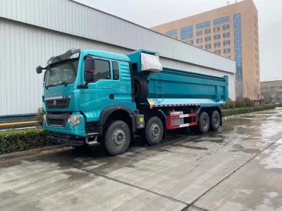 Cina Capacità motore di 8 litri Sinotruk HOWO 8X4 Frontale di sollevamento di scarico per il mercato della Repubblica Democratica del Congo in vendita