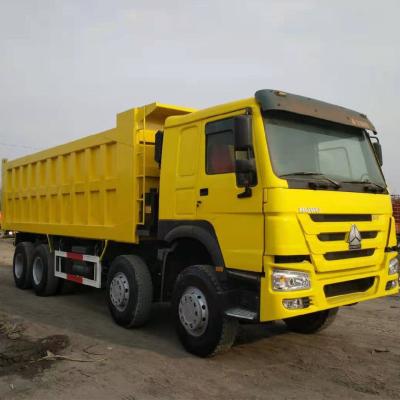 China Sinotruk HOWO 8X4 371HP camião de segunda mão amarelo com transmissão manual à venda