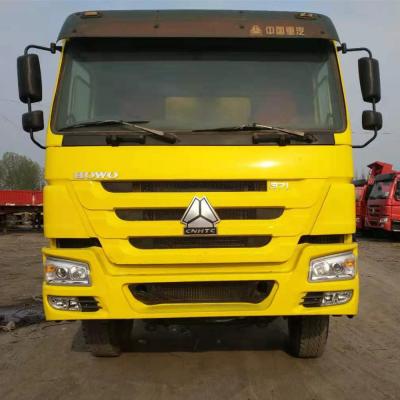 China Sinotruk HOWO 8X4 371HP Secondhand Yellow Dump Truck with Manual Transmission Type for sale