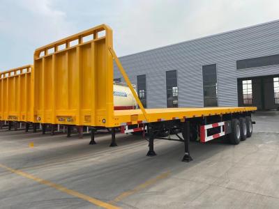 China 20FT 40FT 3 Axle Flatbed Semi Trailers with Jost King Pin and ISO9001 Certification for sale