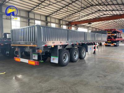 Cina Semi-remolchio per il trasporto di container da 20 ft a 40 ft con parete laterale e pneumatici 315/80r22.5.12r22.5 in vendita