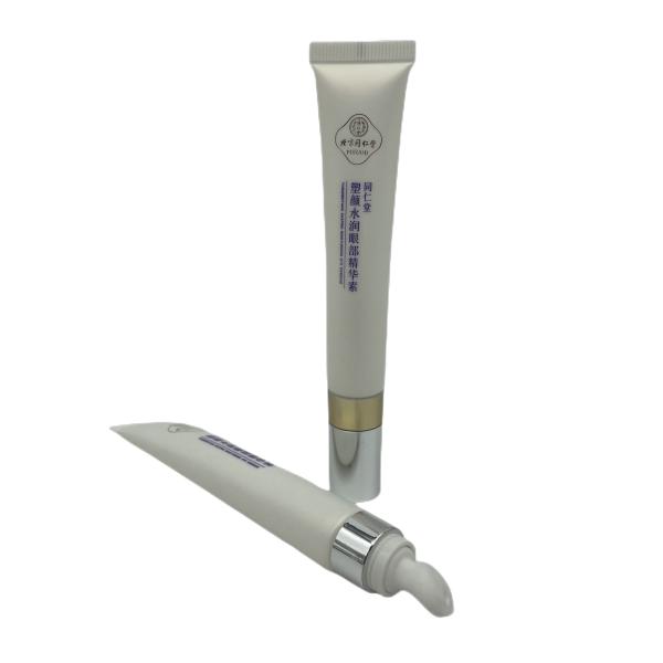 Quality 10ml Sliver Eye Cream Cosmetic Tube in Stock 15ml Squeeze Soft Tube with Massage Applicator Zinc Alloy Eye Cream Tube Packaging for sale