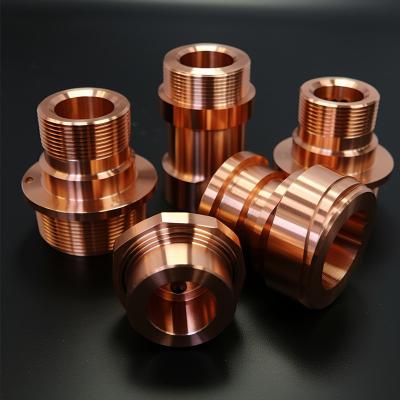 Cina Parti CNC personalizzate di alta qualità Meccanica metallica di precisione Frusciatura Parti di tornitura Meccanica CNC Parti di rame in vendita
