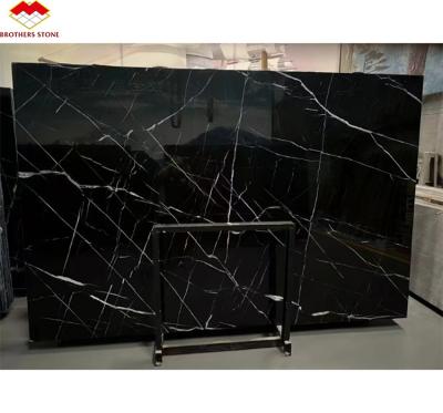 China Modern Design Hotel Nero Marquina Big Slab Zimbabwe Black Marble Floors and Stairs for sale
