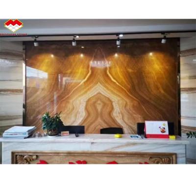 Cina Onica lucidata a caldo grande foglio di lavagna di libro per parete retroilluminata in rivestimento di pietra traslucida in vendita