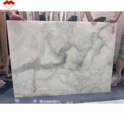 中国 金と青のオニックス大理石 ホテルの床 豪華な天然石 玉石スラブデザイン 販売のため