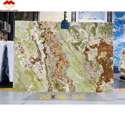 Cina Pannello retroilluminato in marmo di onice verde per il design grafico moderno e la decorazione murale in vendita