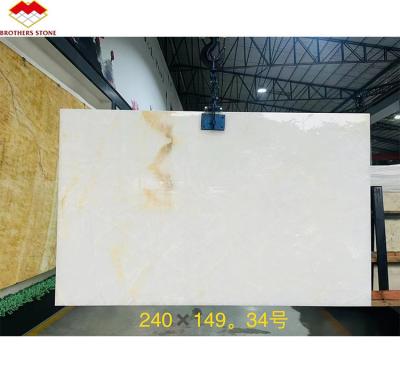 Cina Tipo di marmo in lastra di onice bianco per il piano da cucina di lusso e il design delle pareti da Yunfu in vendita