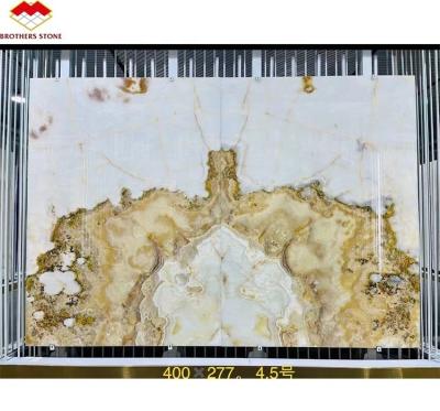 China Moderne witte onyx marmeren muur met boekmatching-platen voor aangepaste natuurlijke stenen decoratie Te koop