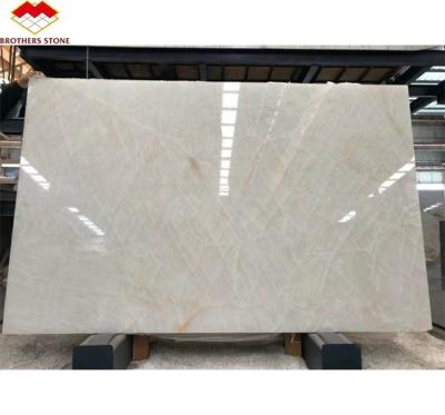 China Modern Ice Jade Snow White Ice Onyx Stone Translucent Cristallo Quartzite Marble Slab for sale
