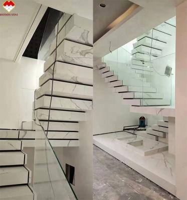 China Customized design polished calacatta white marble look porcelain tile stairs matte sintered stone stair steps and risers for sale
