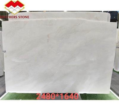 China Modern Royal White Onyx Honed Marble Sheet Cut-to-Size Graphic Design Solution for Wall Panel and Dining Table Set for sale