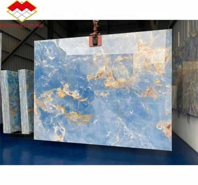 China Natuurlijke doorzichtige onyxplaat Moderne blauwe onyx marmeren steen voor badkamerwand en vloer Te koop