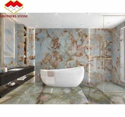 China Natuurlijke doorzichtige onyxplaat Moderne blauwe onyx marmeren steen voor badkamerwand en vloer Te koop