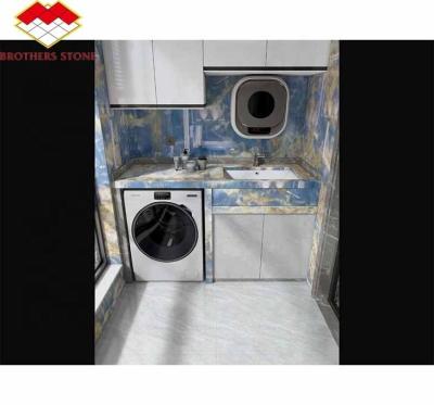 China Natuurlijke doorzichtige onyxplaat Moderne blauwe onyx marmeren steen voor badkamerwand en vloer Te koop