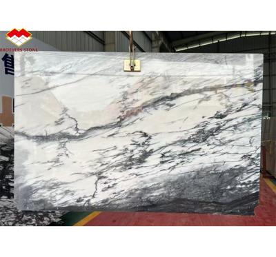 Cina Snow Mountain Bianco Marmo Grandi lastre per il design moderno Tavolo da pranzo Top pietra naturale in vendita
