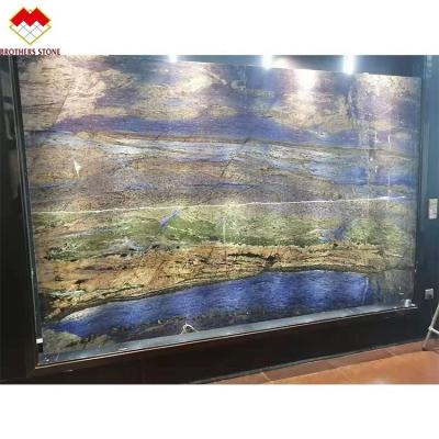 China Gepolijste droomsaffira Blauwe onyx kwartsiteslaag luxe steen achtergrondverlichting doorzichtig Te koop