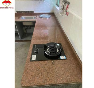 China Moderne gepolijste geslepen Chinese natuursteen op maat gesneden rode granietsteen voor keuken aan tafel Te koop