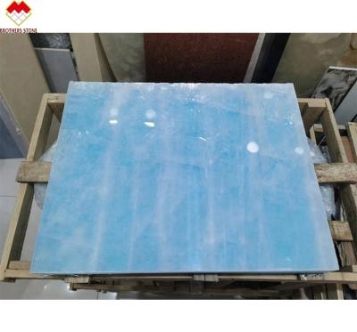 China Prachtige achtergrondverlichting Blauwe kristal Onyx plaat Perfect voor moderne woning en hotel decor Te koop