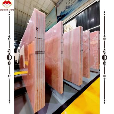 中国 壁パネルとテーブルトップのための白いピンクオニックスストーン 販売のため