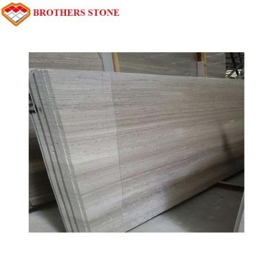 Cina Lastre & mattonelle di legno bianche resistenti all'uso del marmo della vena per il rivestimento per pavimenti & del parete in vendita