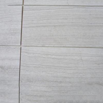 Cina Il grano di legno di prezzo basso di 2018 vendite all'ingrosso ha lustrato il marmo grigio soleggiato in vendita