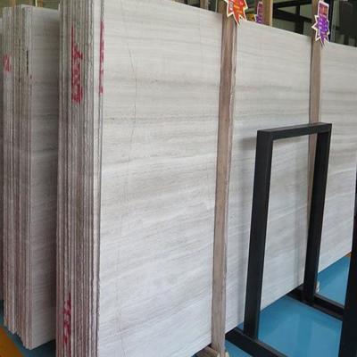 Cina Il grano di legno di prezzo basso di 2018 vendite all'ingrosso ha lustrato il marmo grigio soleggiato in vendita