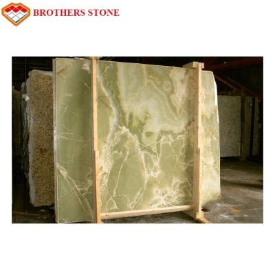 Cina Dimensione su ordinazione della lastra del marmo di onyx di verde di colore leggero per il fondo della TV in vendita