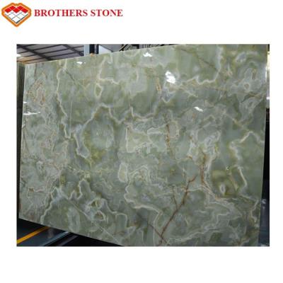 Cina Dimensione su ordinazione della lastra del marmo di onyx di verde di colore leggero per il fondo della TV in vendita