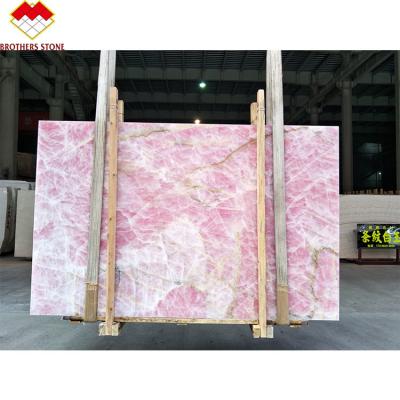 Cina Pannello di parete retroilluminato del marmo di onyx di era glaciale Crystal Pink Onyx Countertop traslucido in vendita