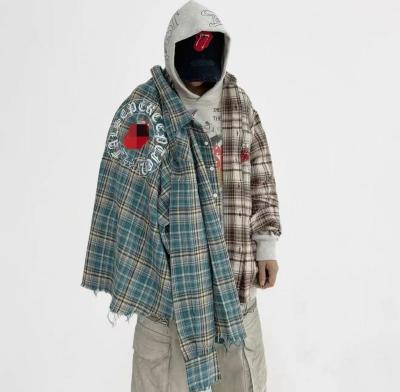 China Men’s Vintage-Inspired Plaid Shirt with Distressed Raw-Edge Hem and Chest Graphic Detail for sale