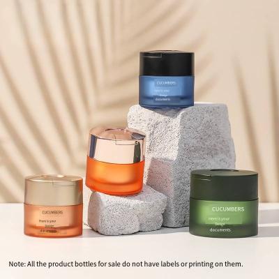 China New cosmetic packaging 15g/30g/50g white-cap with measuring spoon facial cream bottle - travel-sized dispensing jar for sale