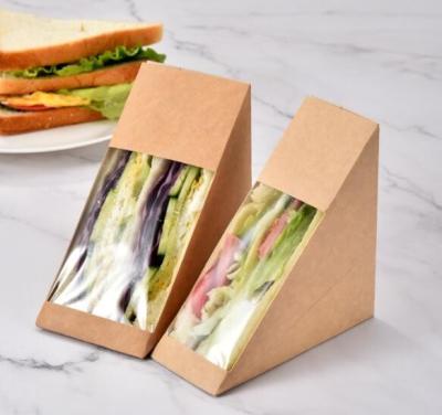 China Oil Proof Tiangle Sandwich Packaging Box 330gsm Kraft Paper Food Packaging for sale